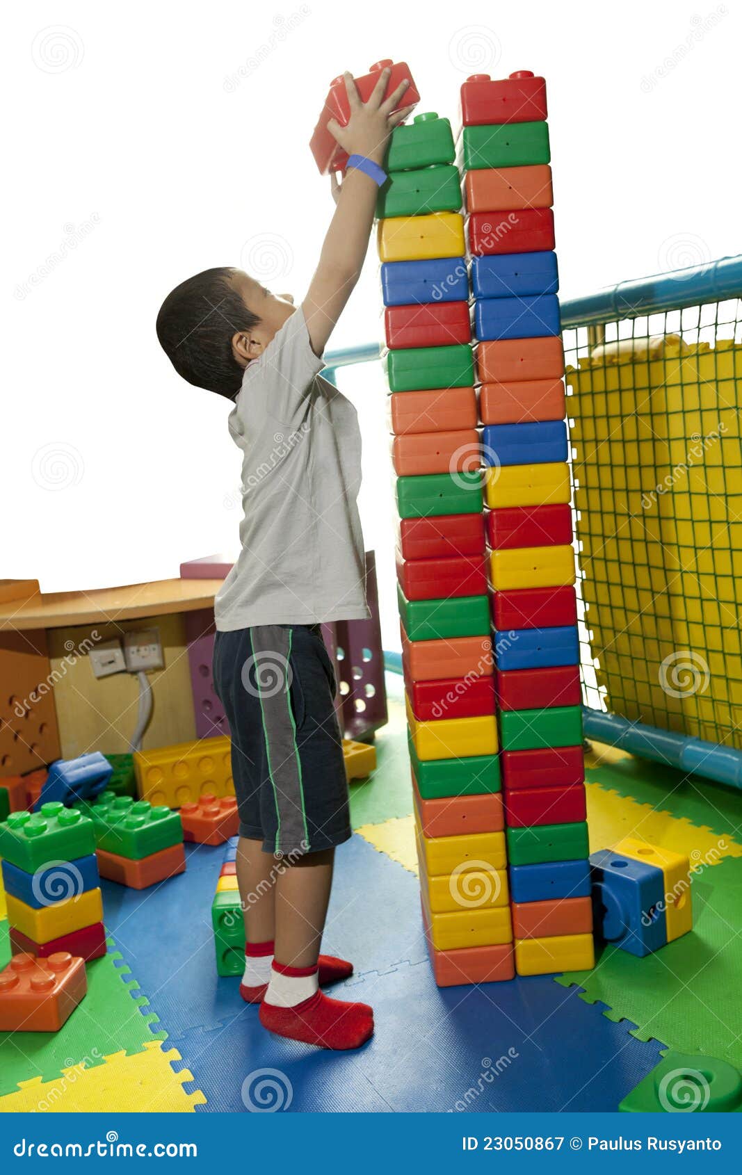 Boy Seriously Build Tower Block Royalty Free Stock Photography - Image ... Boy Seriously Build Tower Block Royalty Free Stock Photography - Image ...
