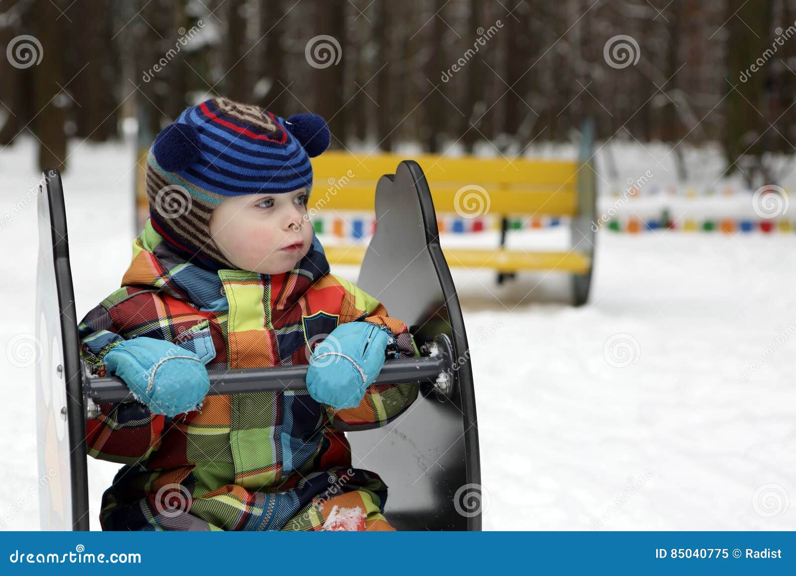Boy shaking at playground stock image. Image of mittens - 85040775