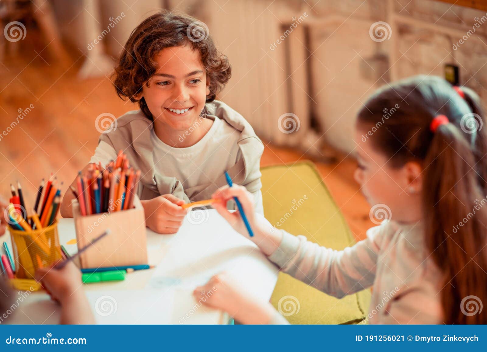Boy Sharing a Color Pencil with a Girl Stock Image - Image of ...
