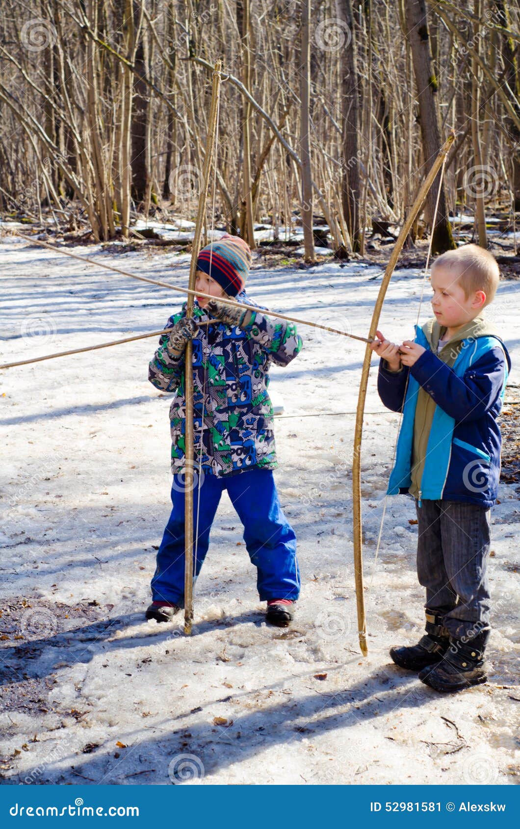 Boy shoots a bow stock image. Image of activities, color - 52981581