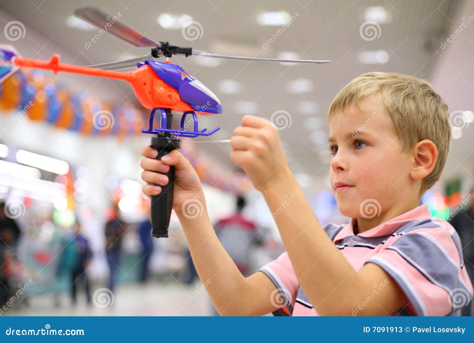 Boy in Shop with Toy Helicopter Stock Image - Image of business ...