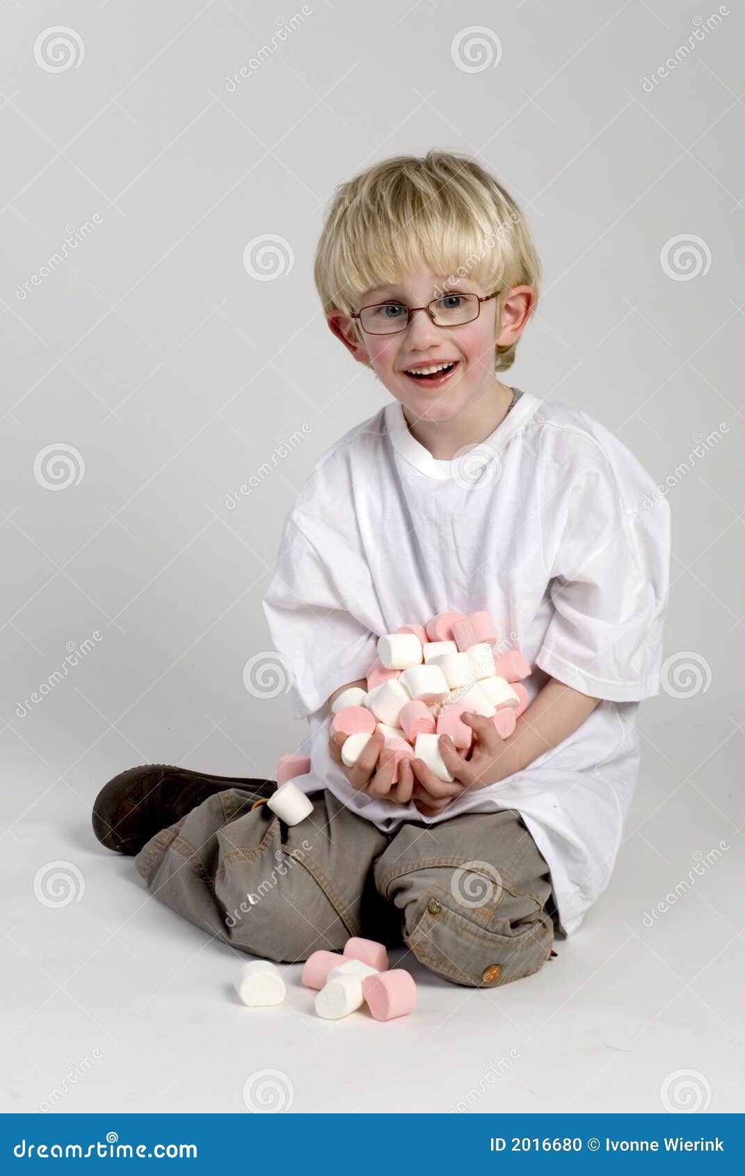 Boy is Showing Lots of Candy Stock Photo - Image of pink, light: 2016680