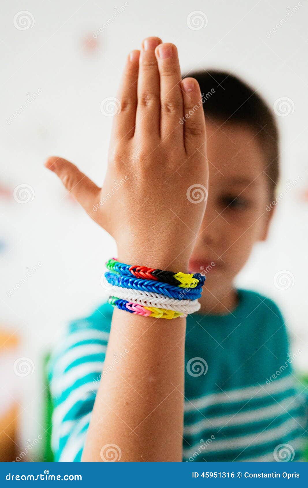Boy Showing Rubber Bracelets Stock Photo - Image of loom, band: 45951316