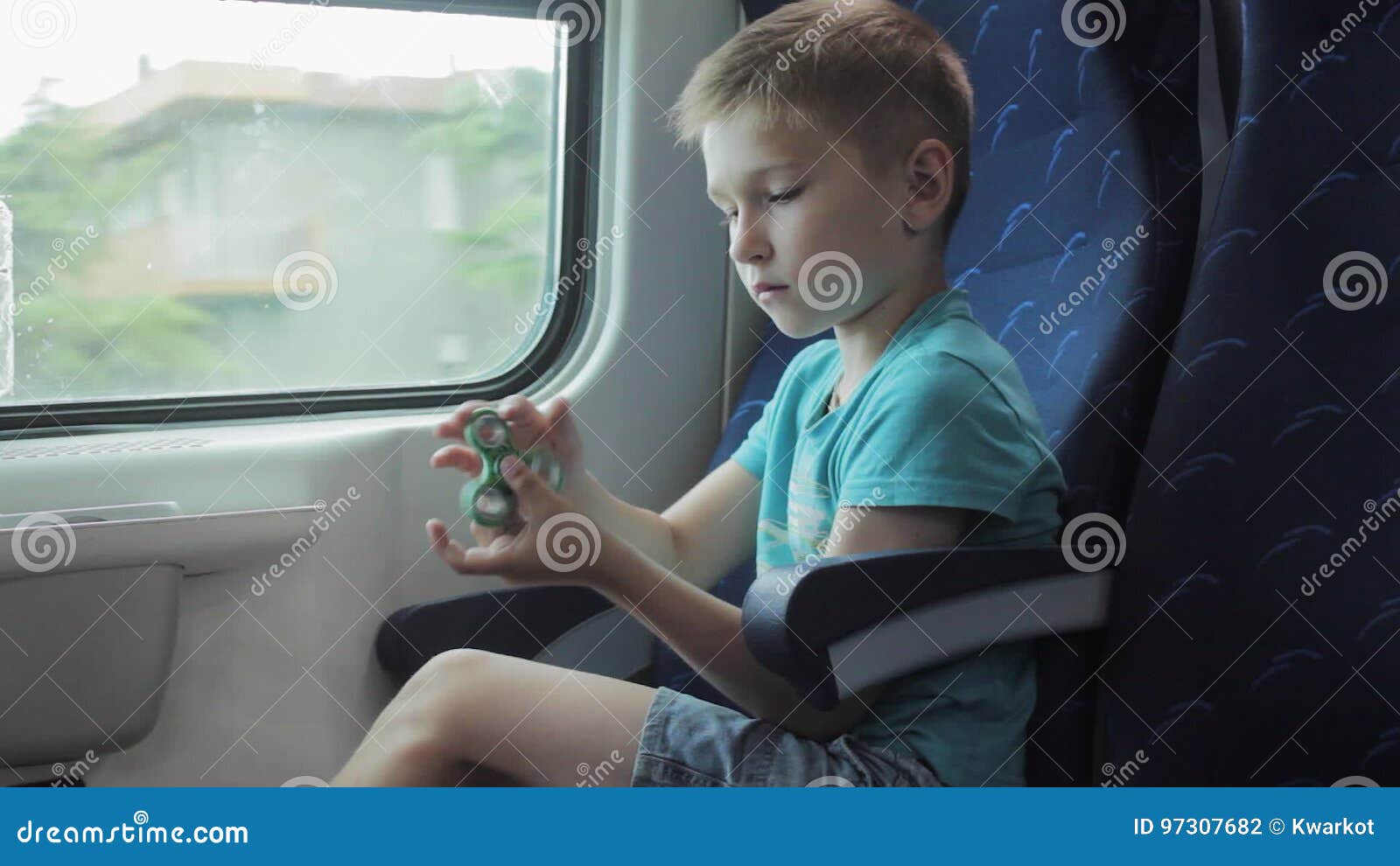 Boy Showing Skills by Flicking Fidget Spinners with Finger Stock ...