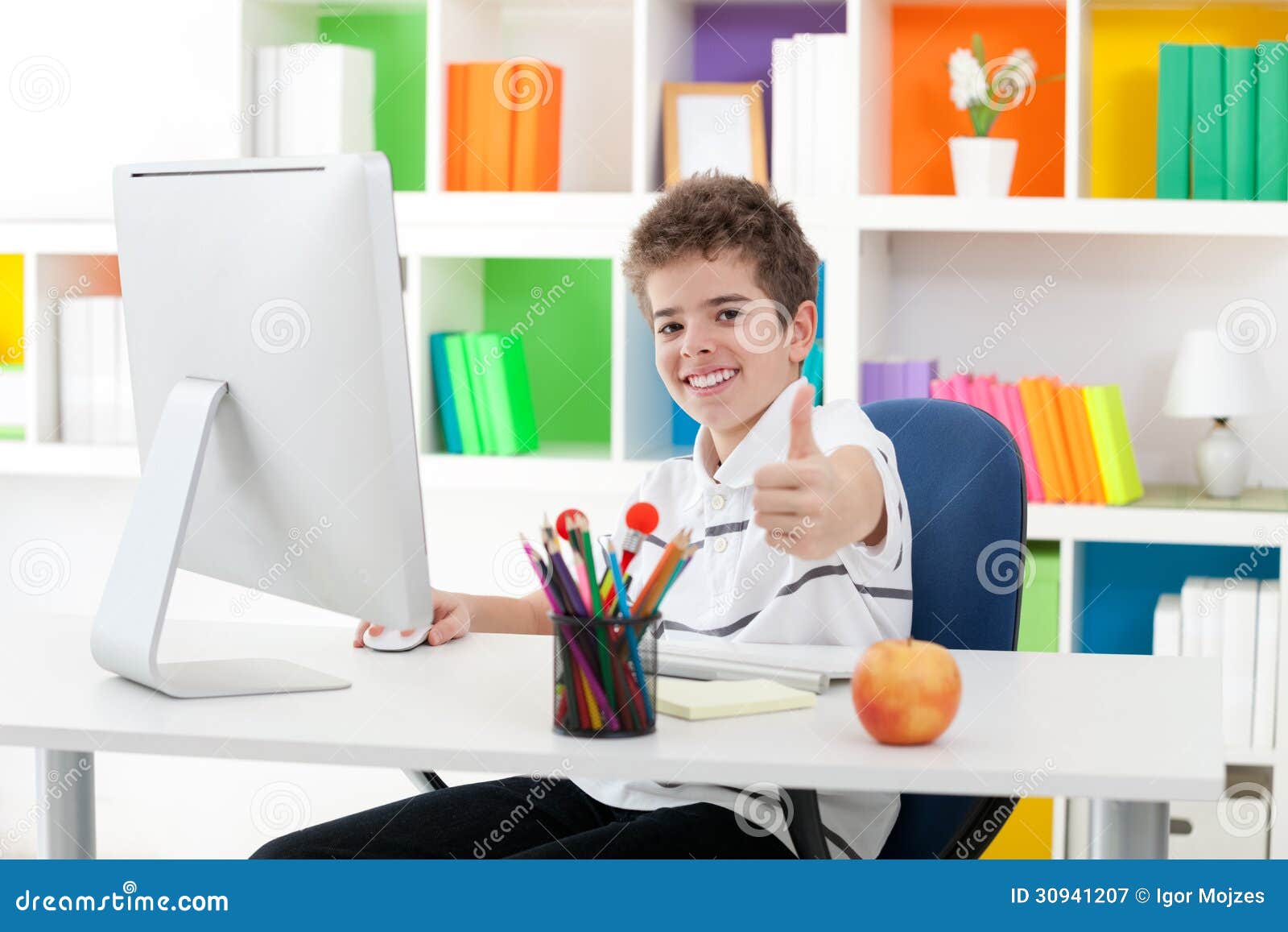 Boy showing thumb up stock image. Image of education - 30941207