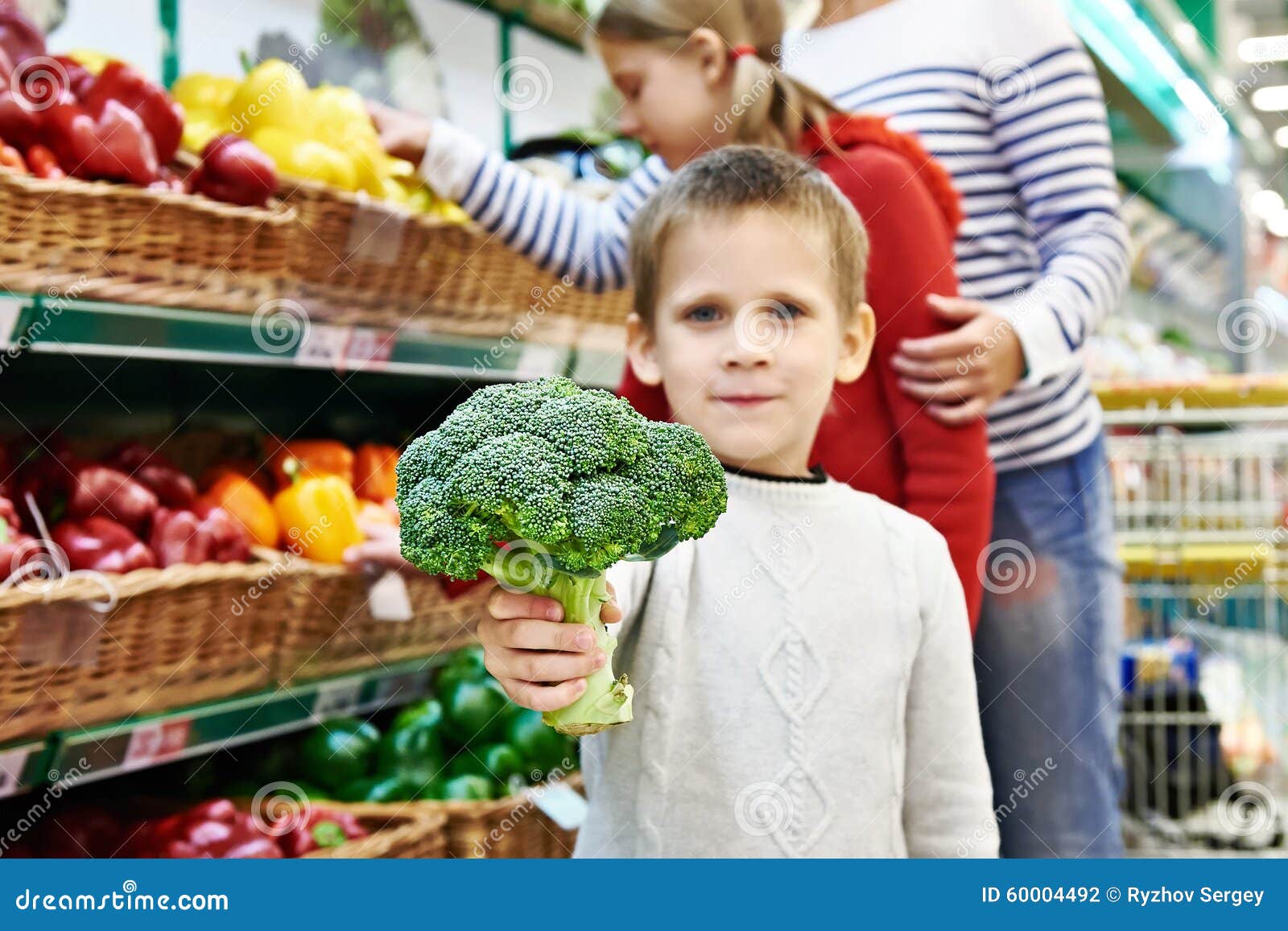 Boy shows broccoli stock photo. Image of children, bell - 60004492
