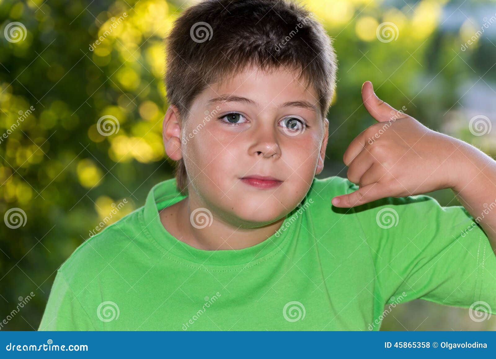 The Boy Shows Gesture Call in Nature Stock Photo - Image of beautiful ...