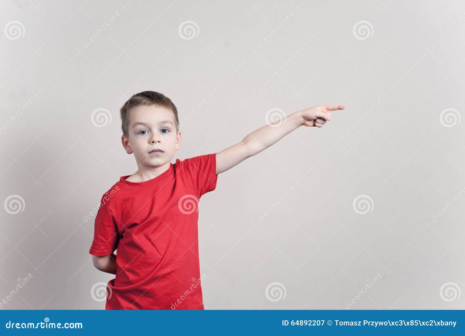 Boy shows stock image. Image of studio, hand, shows, white - 64892207