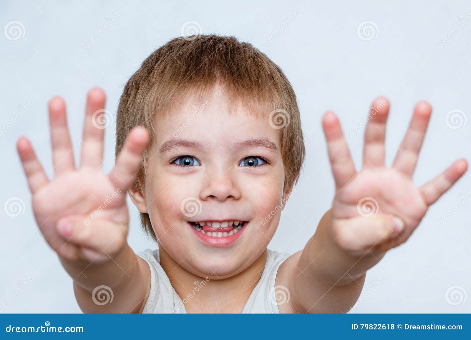 The boy shows palms stock photo. Image of hands, children - 79822618