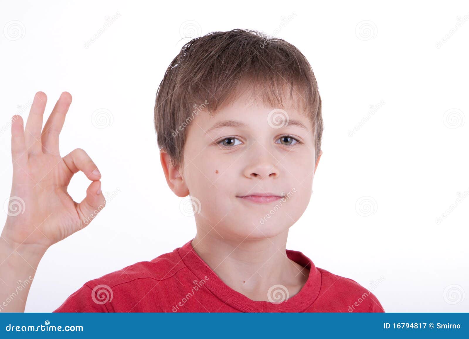The boy shows a sign OK stock image. Image of schoolboy - 16794817