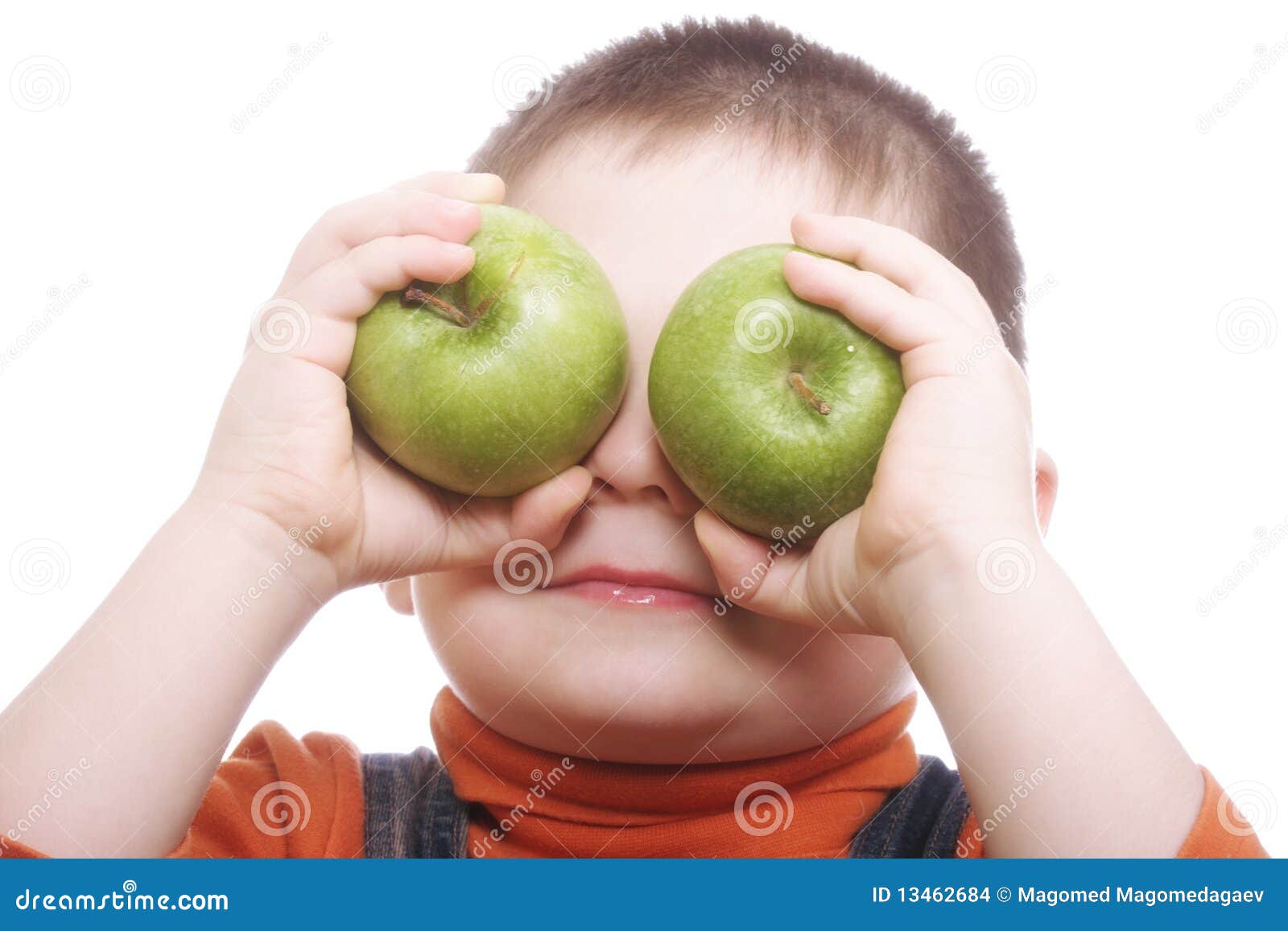 Boy Shutting Eyes with Apples Stock Photo - Image of green, apple: 13462684