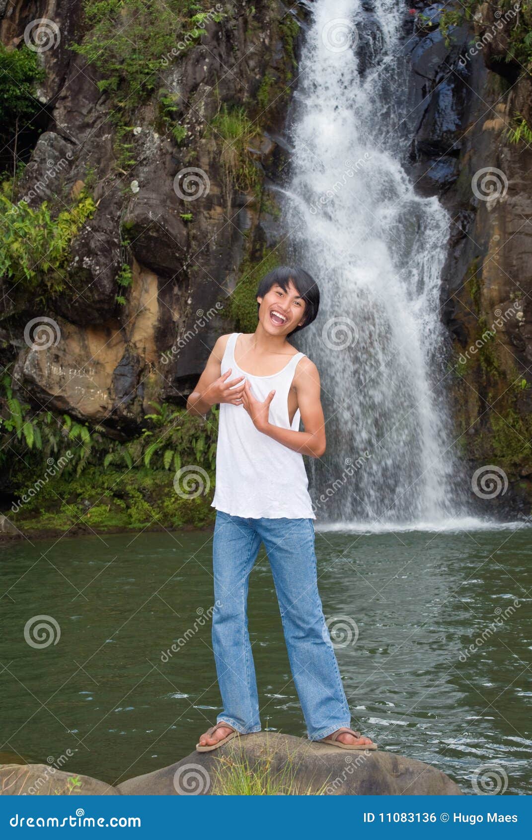 Boy singing at waterfall stock photo. Image of scenery - 11083136