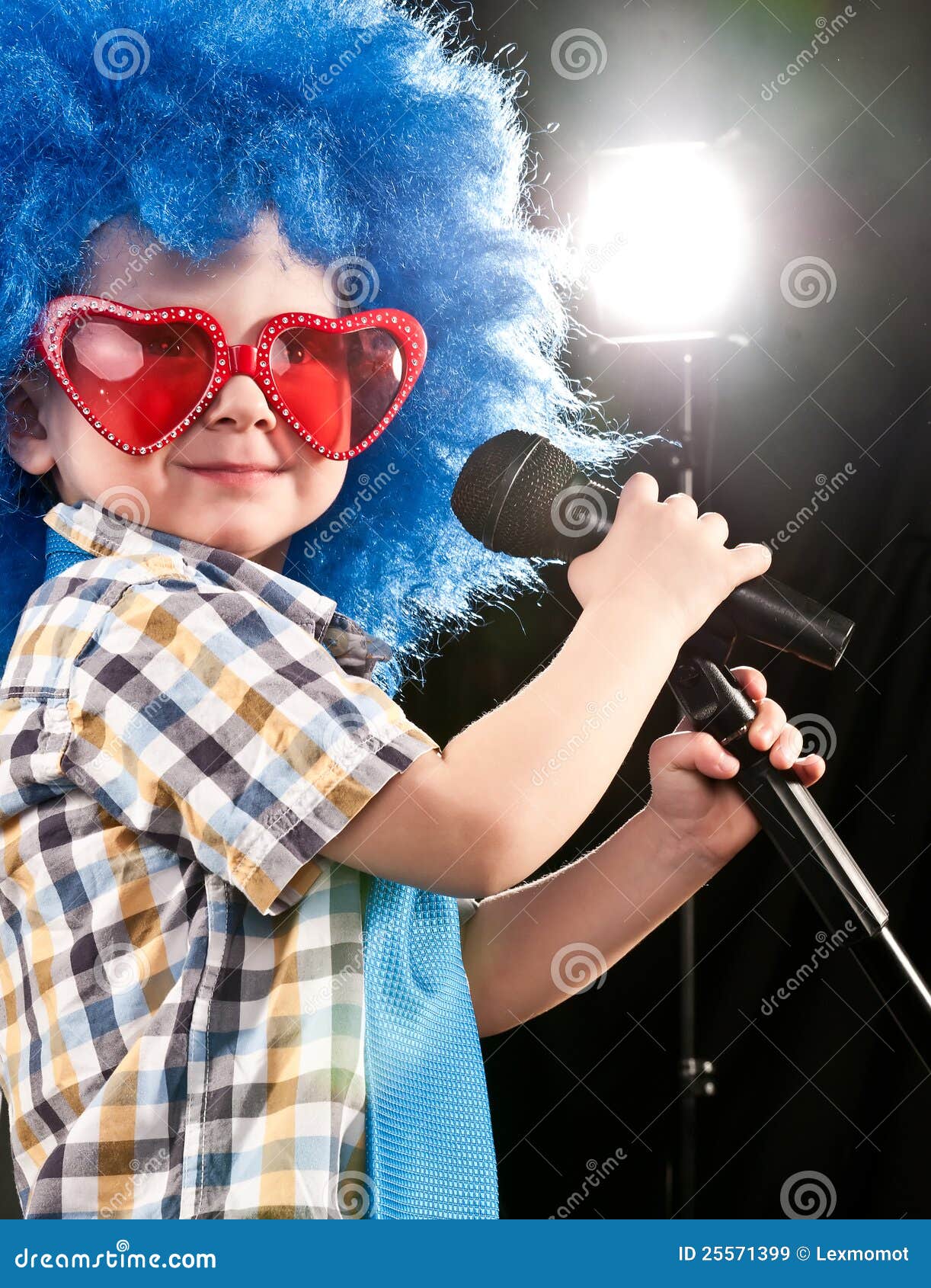 Boy Sings into a Microphone Stock Image - Image of music, background ...
