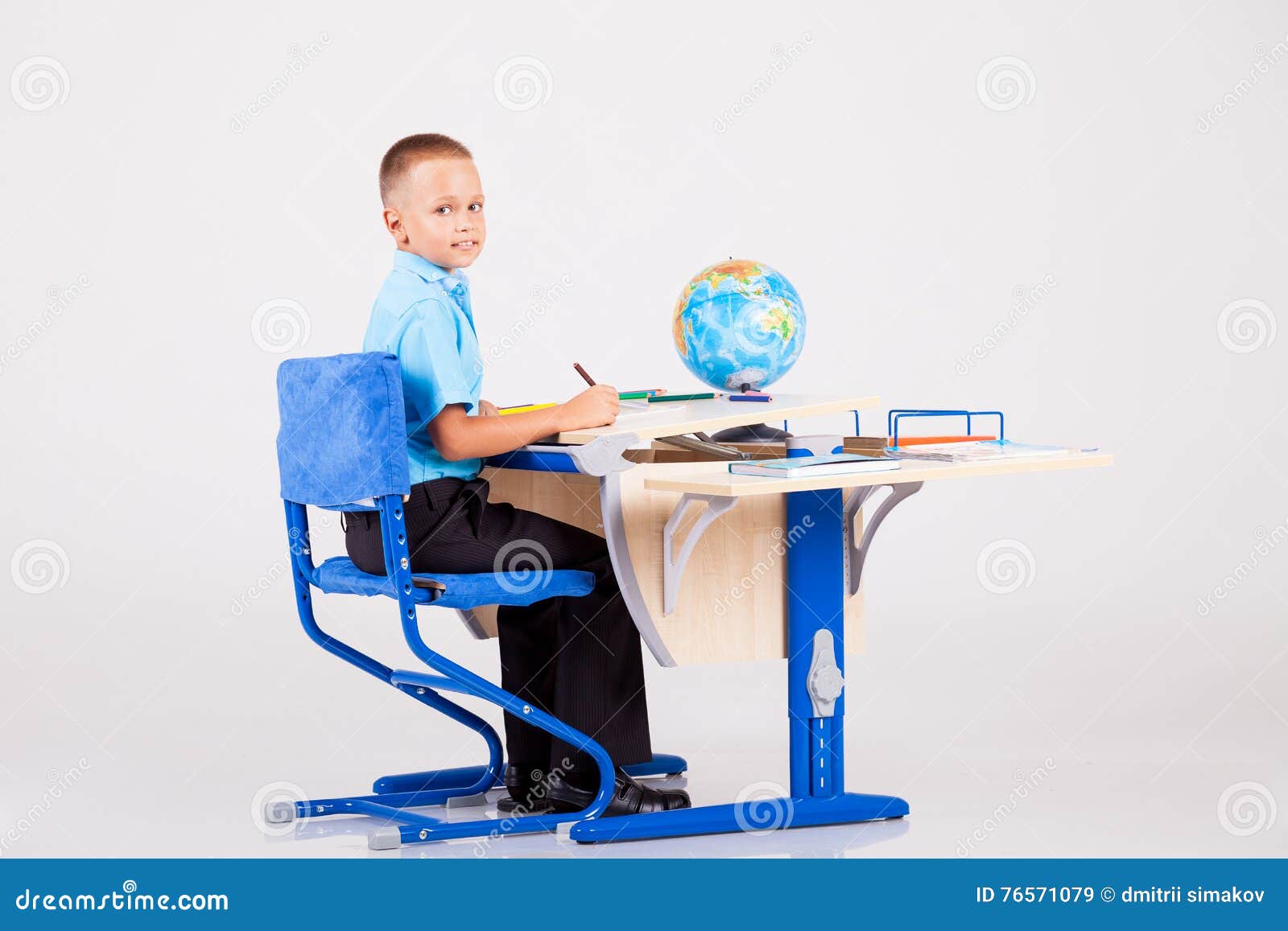 Boy Sits at His Desk and Doing Homework Stock Image - Image of children ...