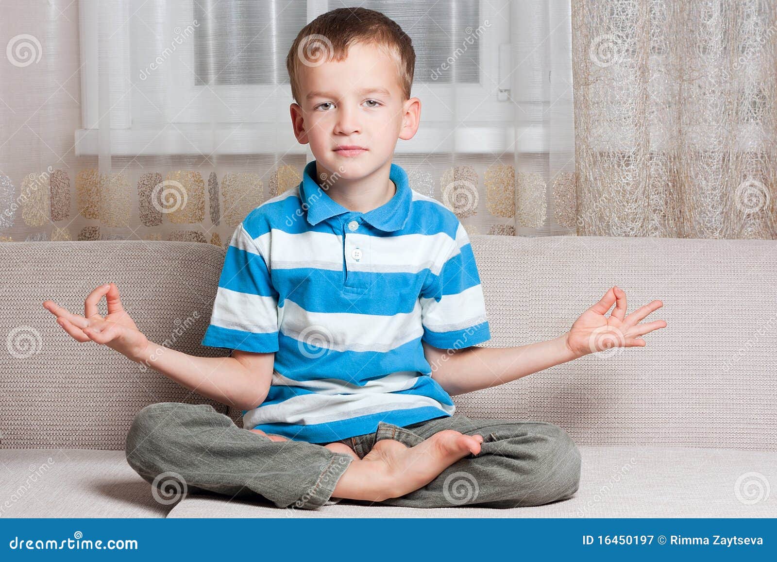 Boy Sits in a Lotus Position. Stock Image - Image of rest, child: 16450197