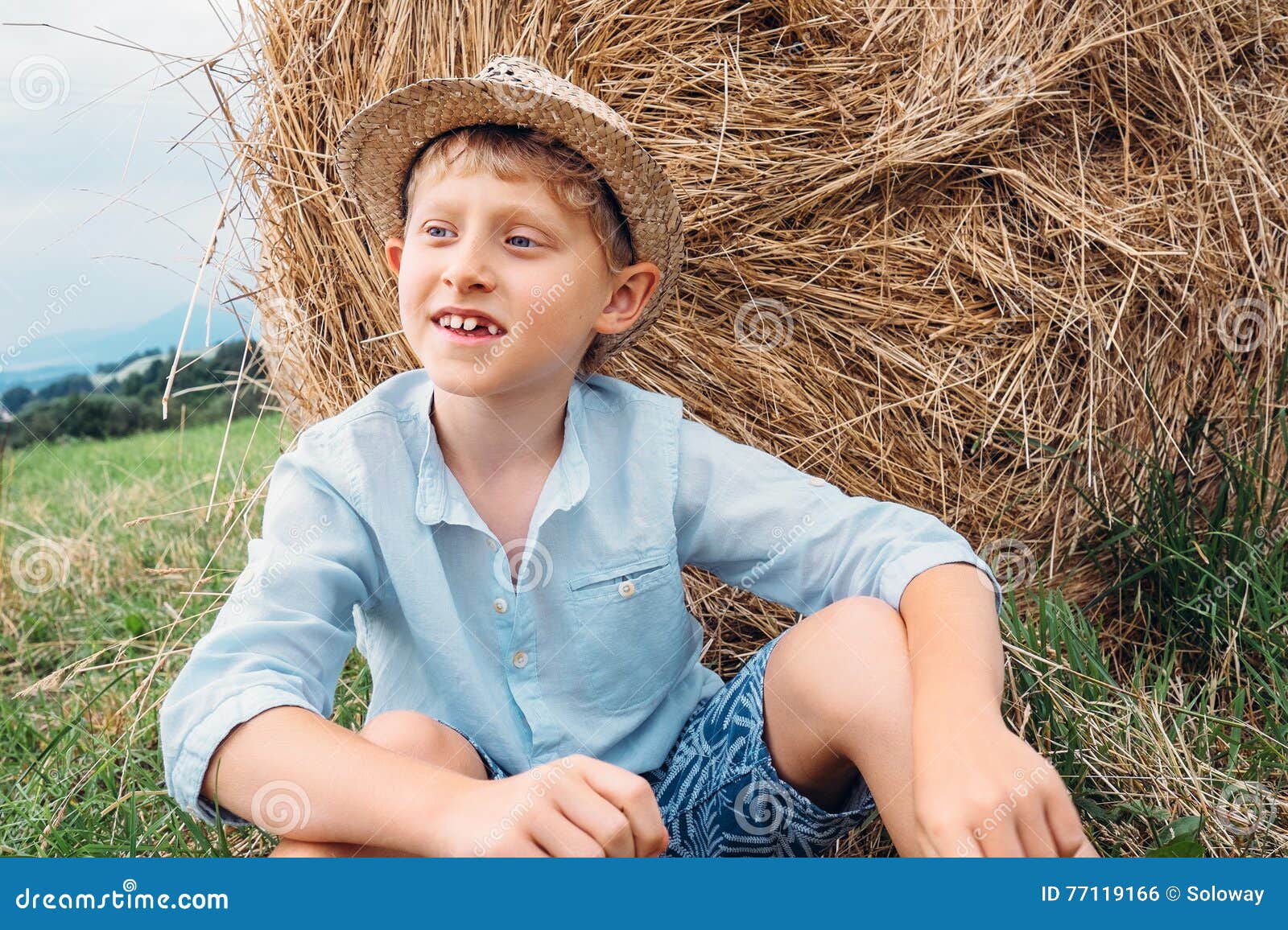 Boy Sits Near Big Haystack on the Field Stock Photo - Image of cute ...