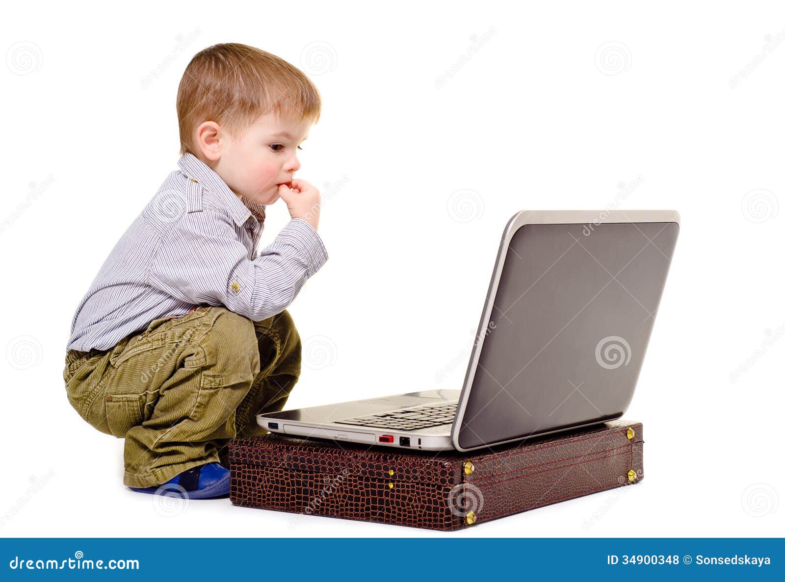 Boy sits at a notebook stock photo. Image of laptop, intelligence ...