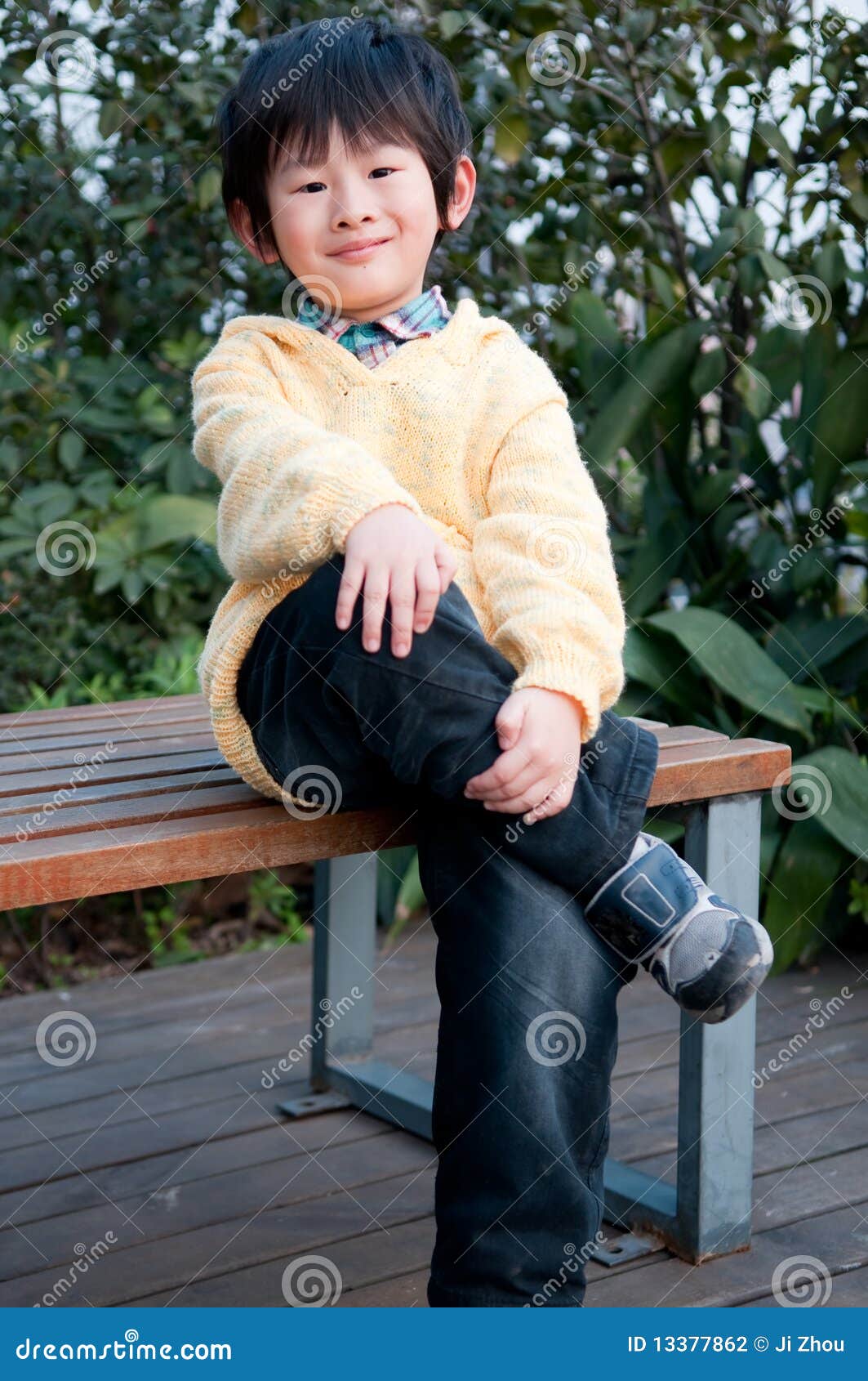 Boy sitting stock photo. Image of childhood, face, playful - 13377862