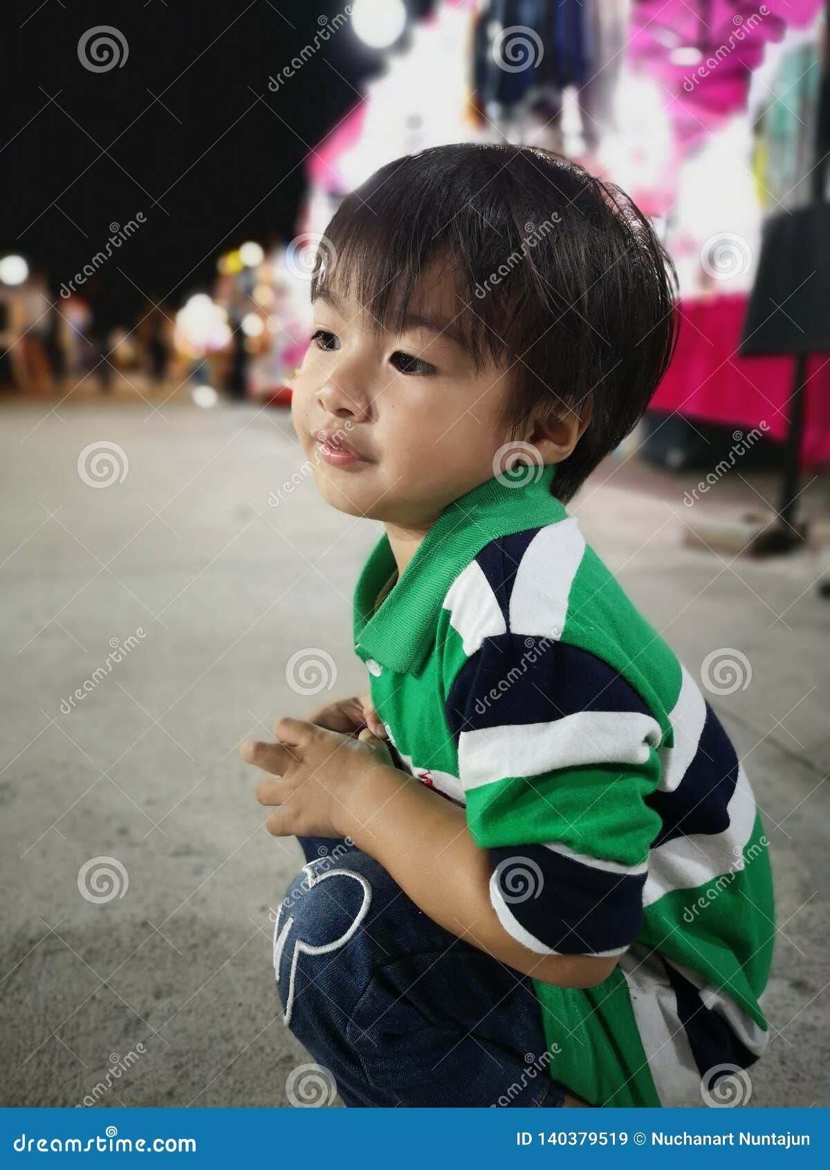 The boy sitting alone. stock image. Image of beautiful - 140379519