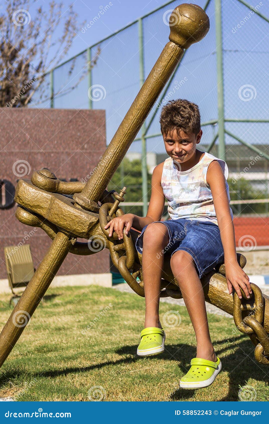 Handsome Boy Sitting on Anchor Stock Image - Image of camera, eyes ...