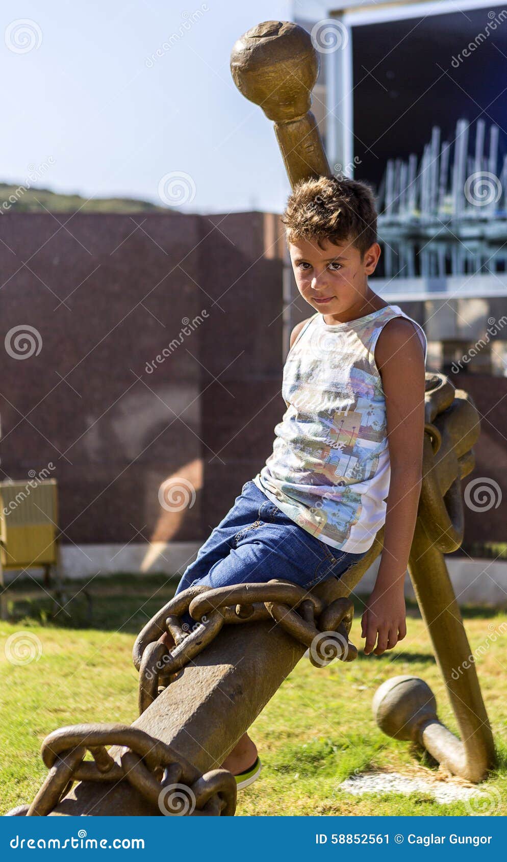 Handsome Boy Sitting on Anchor Stock Image - Image of handsome, anchor ...