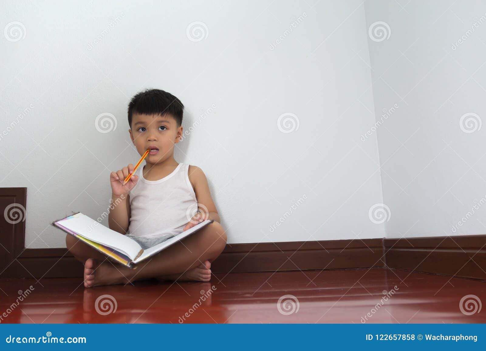 Boy is Sitting Back To the Lesson. Stock Photo - Image of back, happy ...