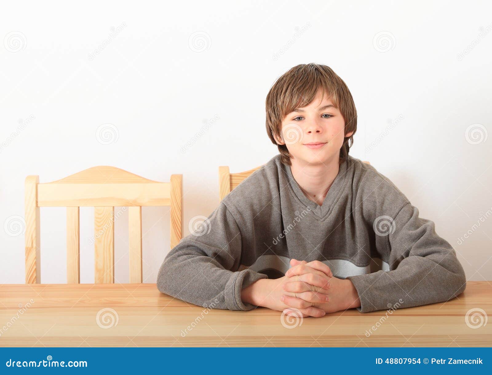 Boy Sitting Behind Wooden Table Stock Photo - Image of chair, table ... Boy Sitting Behind Wooden Table Stock Photo - Image of chair, table ...