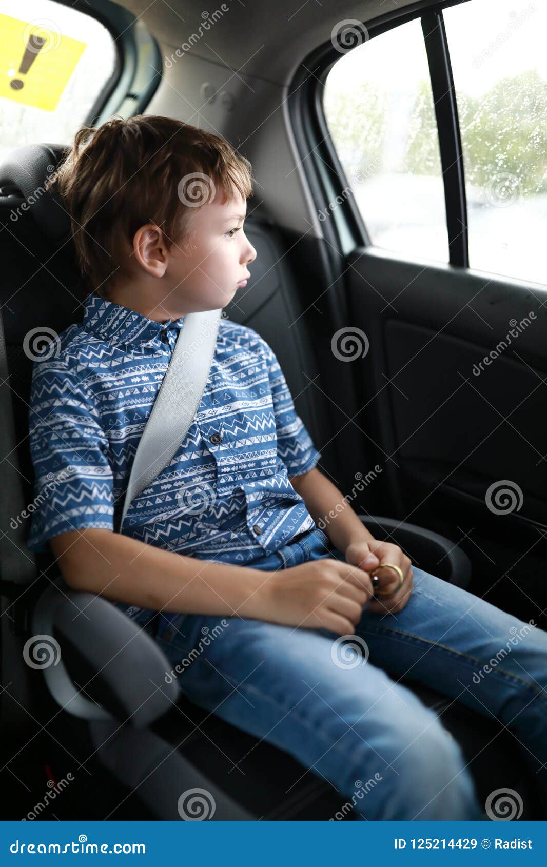 Boy sitting in car stock image. Image of caucasian, inside - 125214429