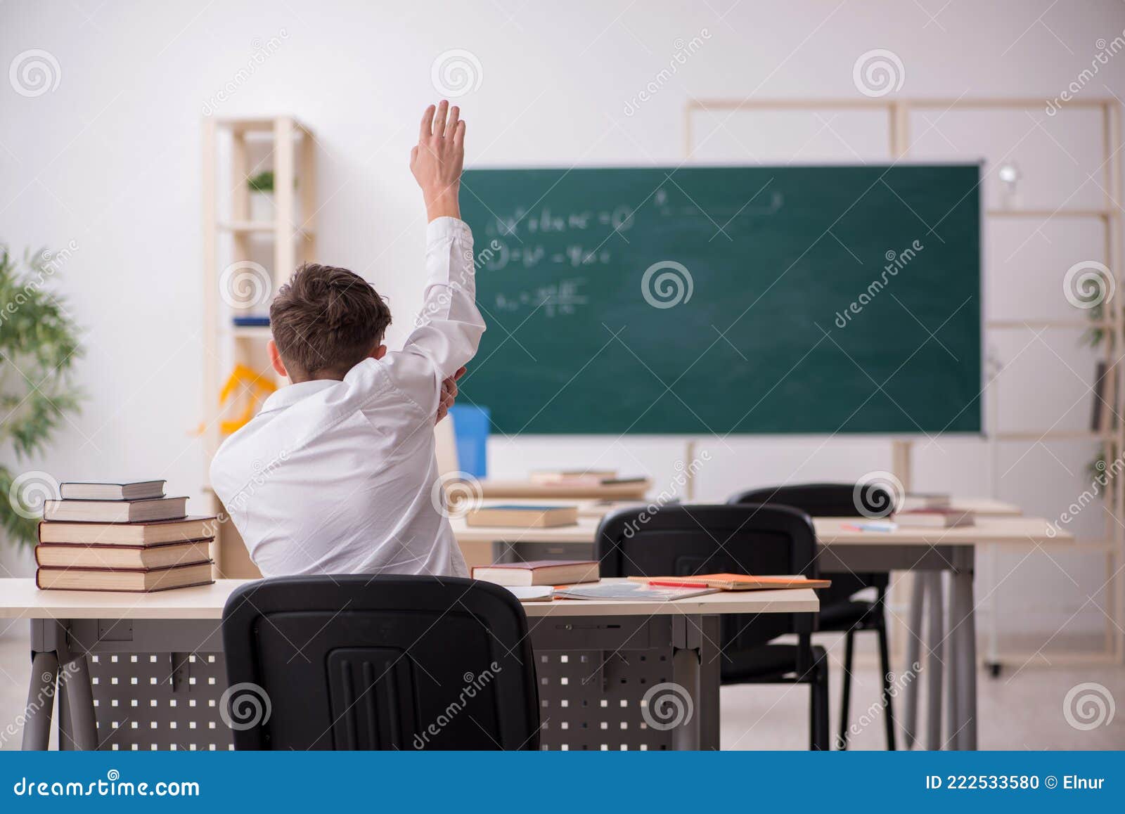 Boy Sitting in the Classrom Stock Photo - Image of classroom, class ...