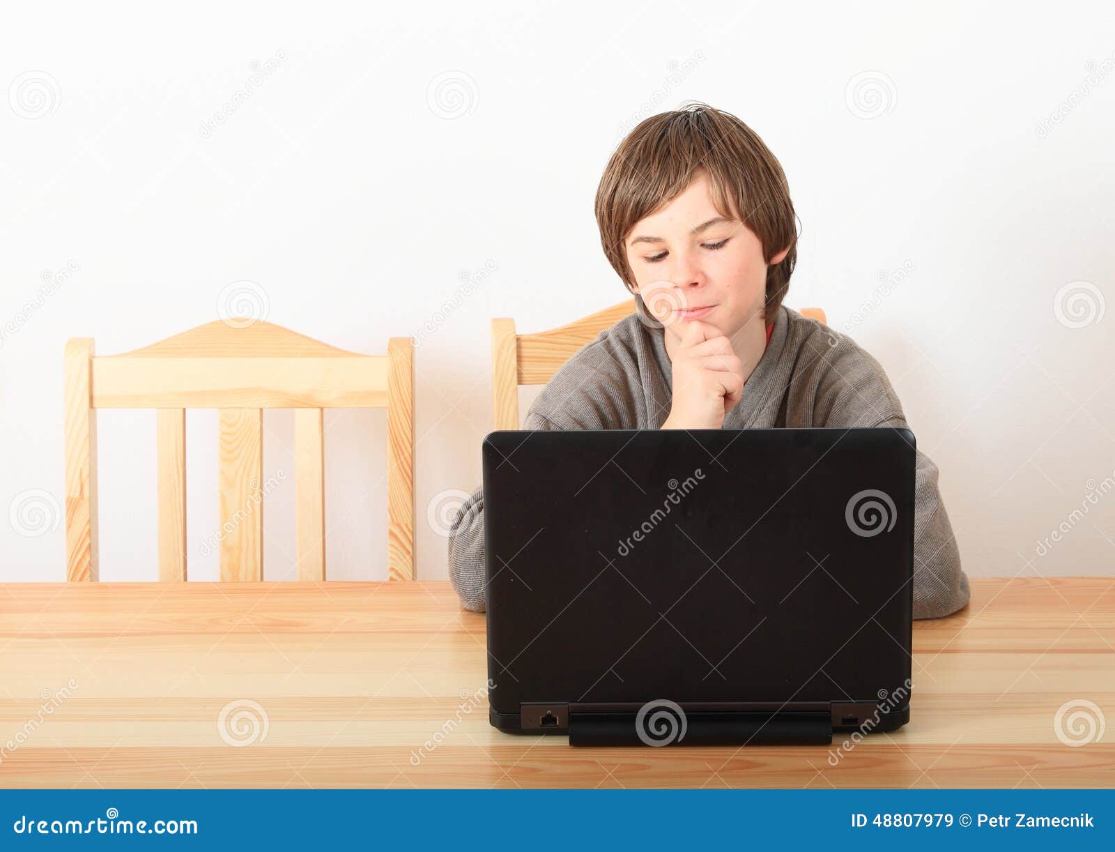 Boy Sitting with a Computer Stock Image - Image of chairs, comp: 48807979 Boy Sitting with a Computer Stock Image - Image of chairs, comp: 48807979