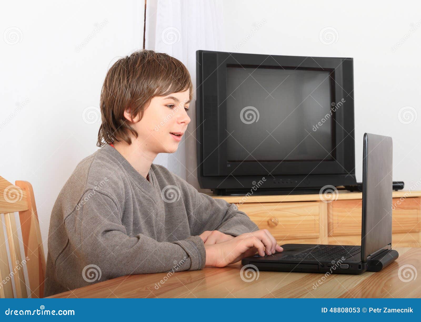 Boy Sitting with a Computer Stock Image - Image of notebook ...