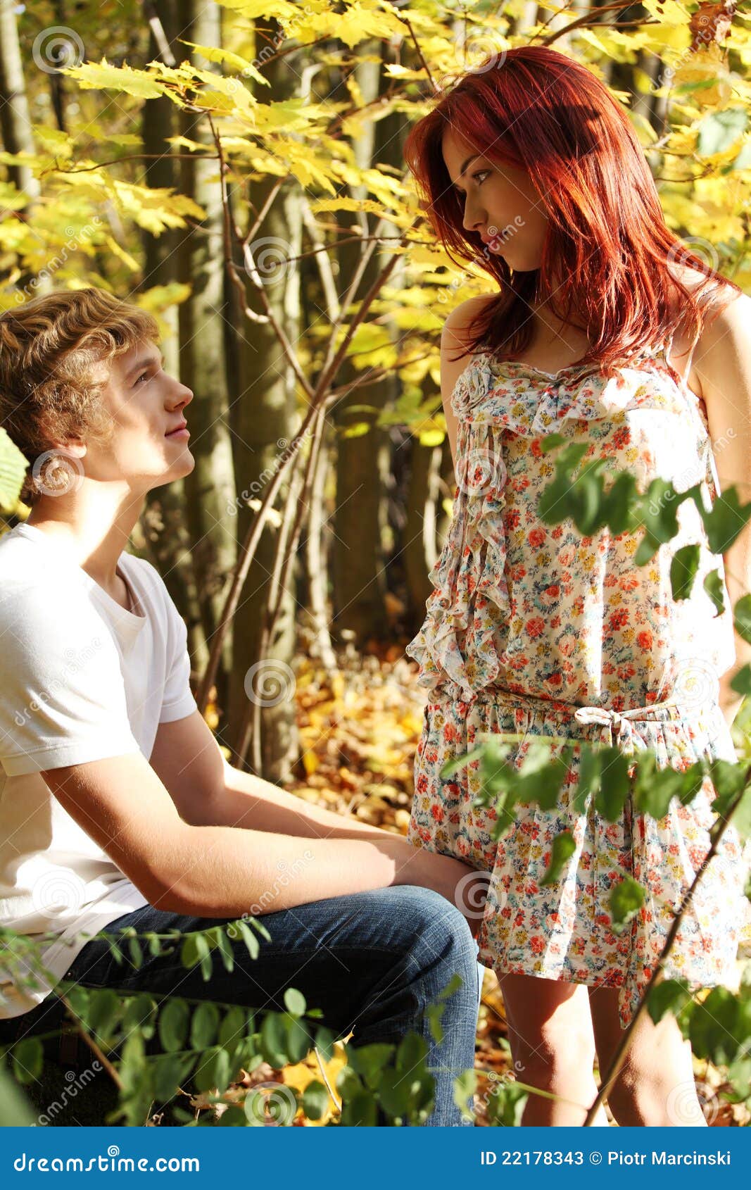 Boy Sitting Down with Girl Standing. Stock Image - Image of girl ...