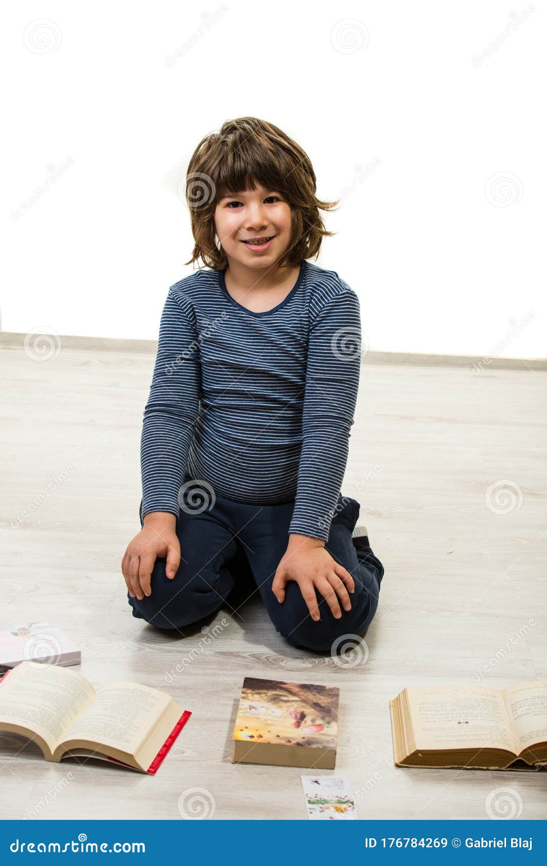 Boy Sitting Down and Reading Books Stock Image - Image of open, people ...