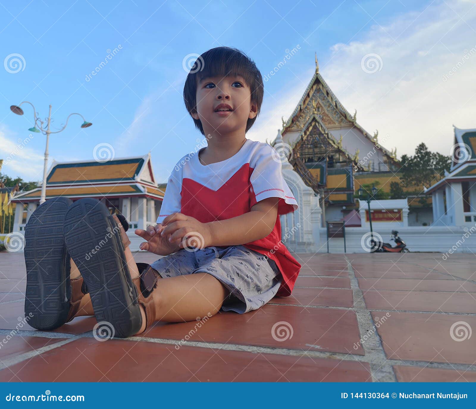 The Boy Sitting Down Relaxable. Stock Photo - Image of little, children ...