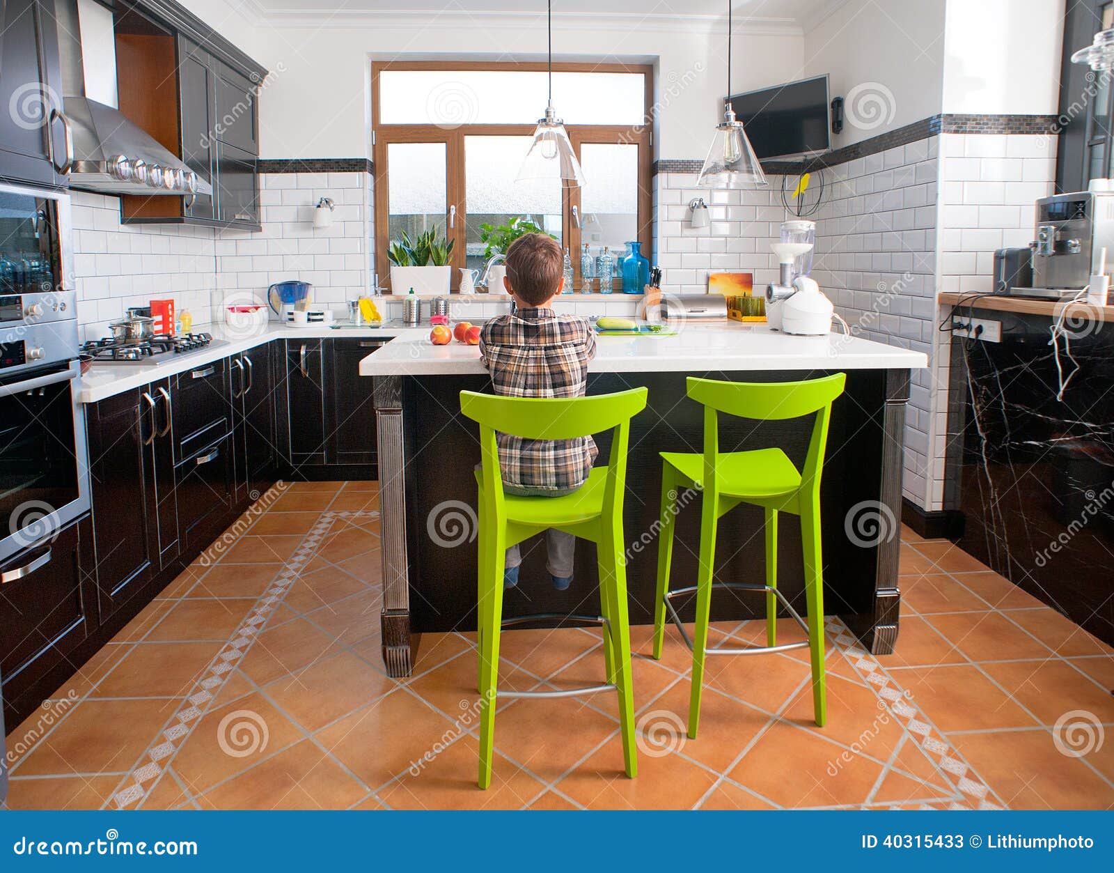 Boy Sitting in Front of Table in the Kitchen Stock Image - Image of ...