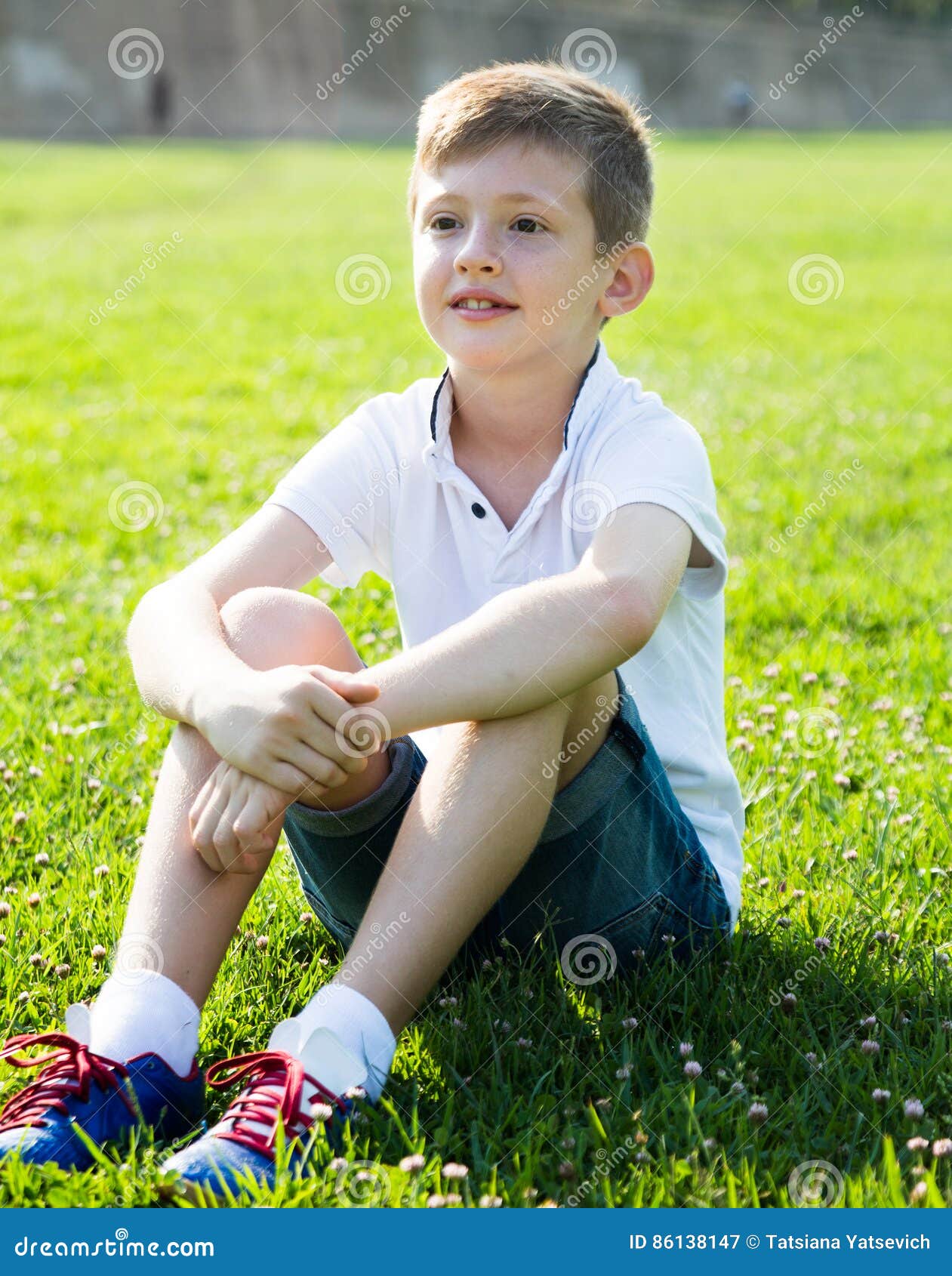 Boy sitting grass stock image. Image of beautiful, positive - 86138147