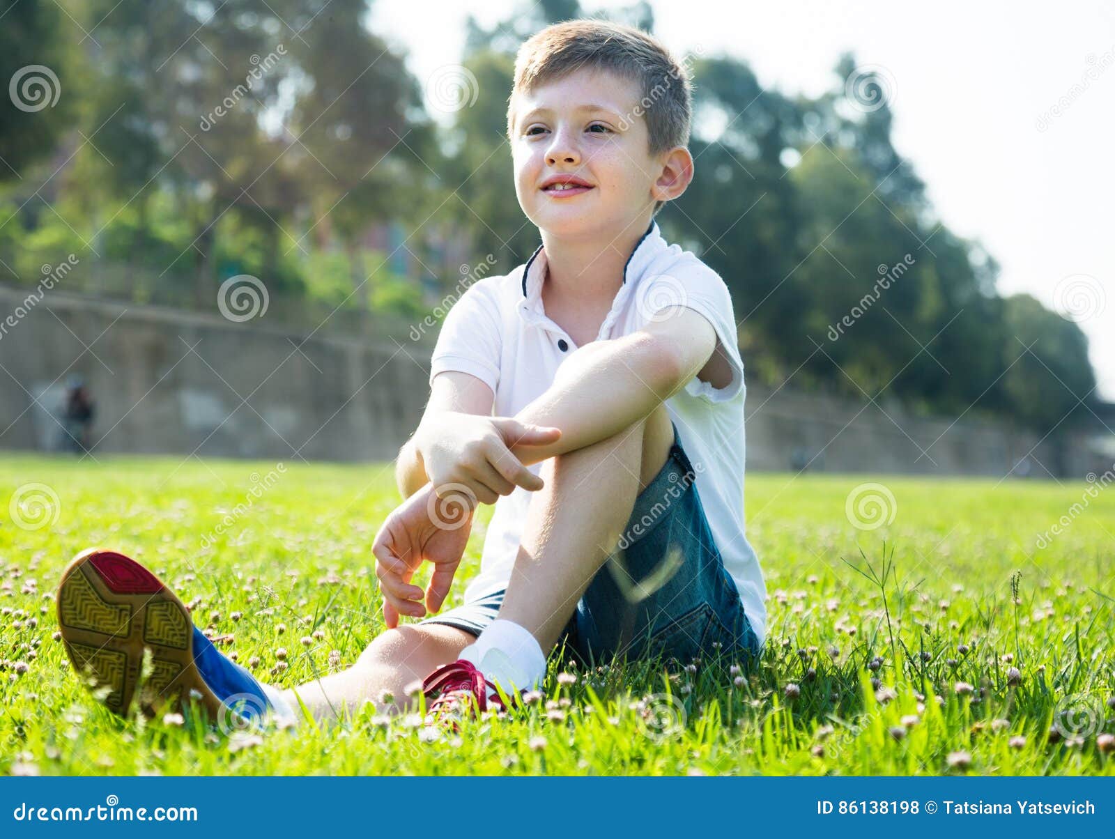 Boy sitting grass stock photo. Image of offspring, australian - 86138198