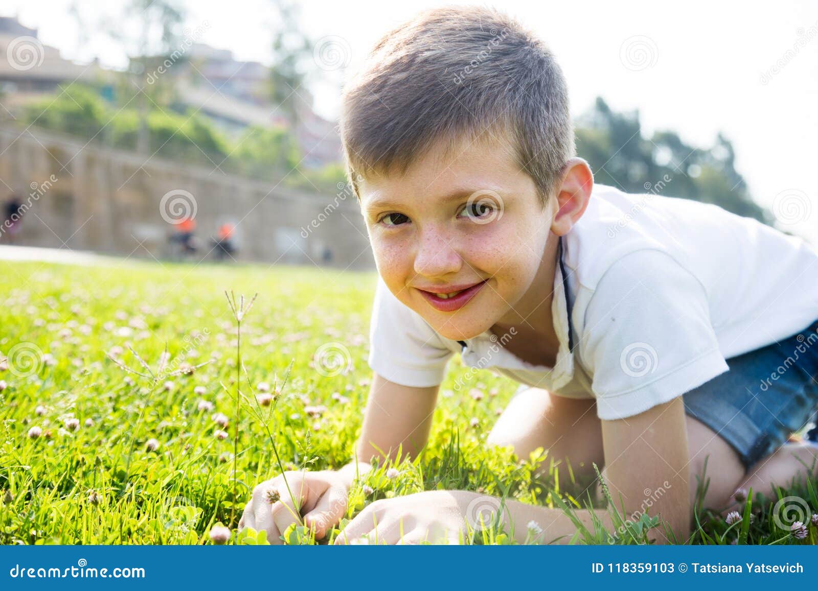 Boy sitting grass stock image. Image of outdoors, clothing - 118359103