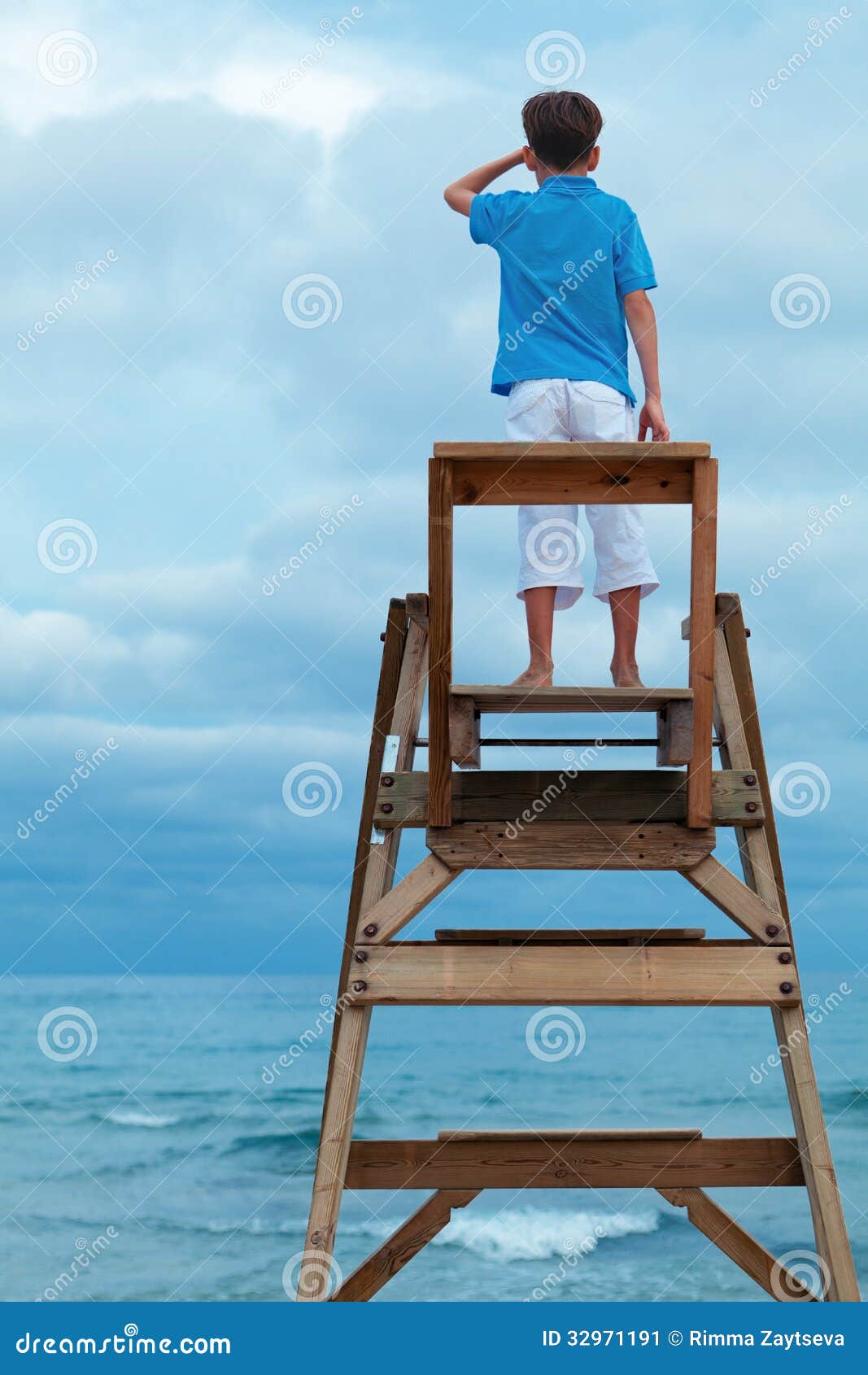 Boy Sitting on Lifeguard Chair Stock Image - Image of mediterranean ...