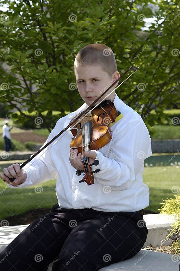 Boy Sitting Outside Playing Viola Stock Image - Image of tone, outside ...