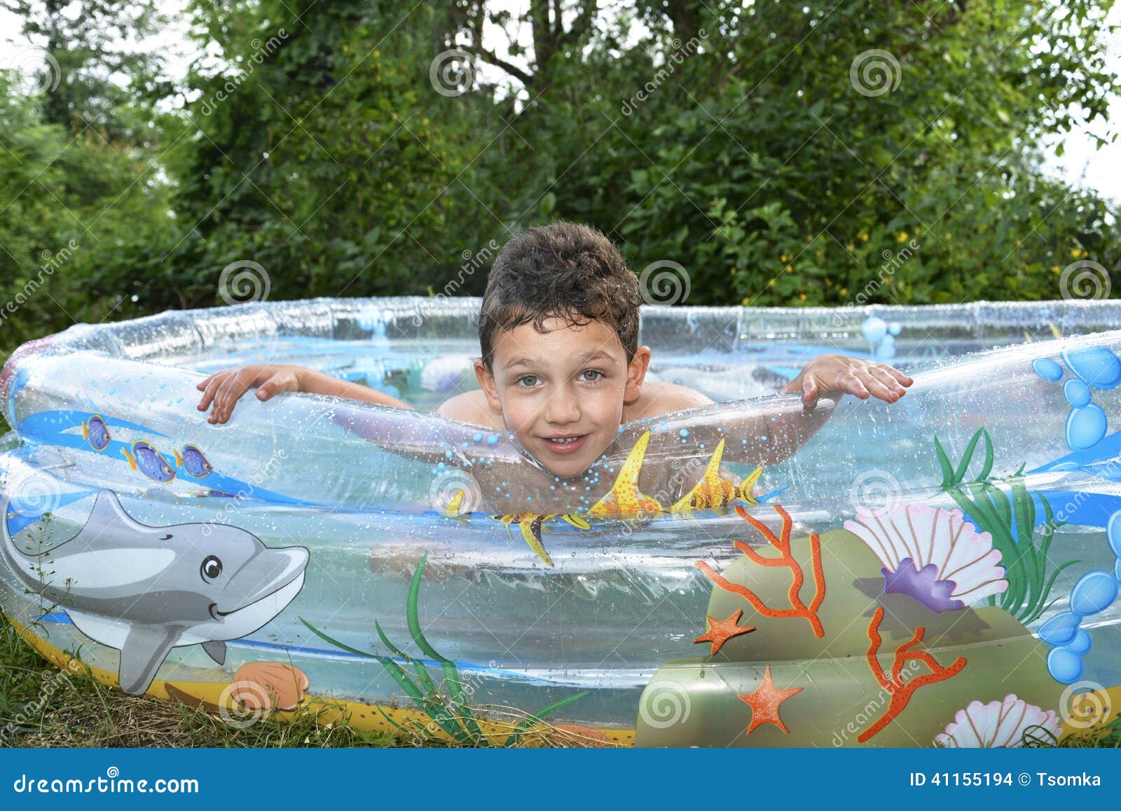 Boy sitting in the pool. stock photo. Image of relaxation - 41155194