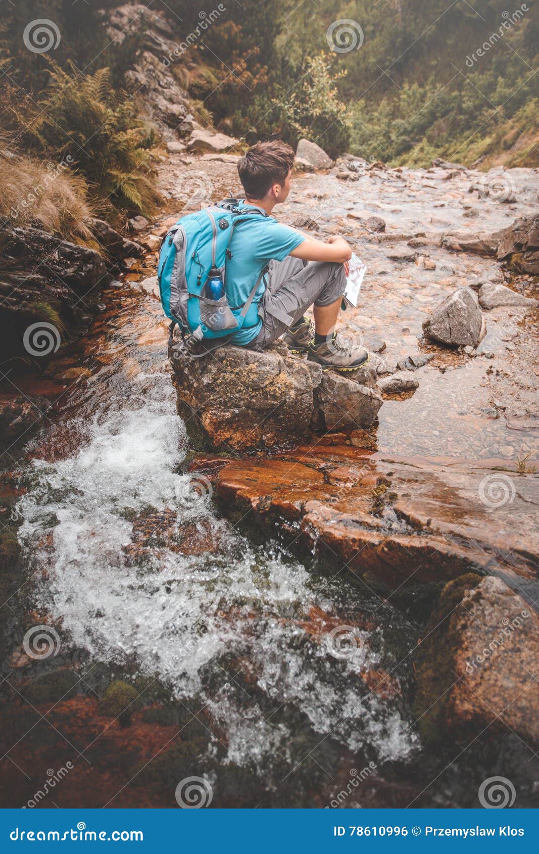 Boy Sitting on a Rock on Mountain Trail Stock Photo - Image of holiday ...