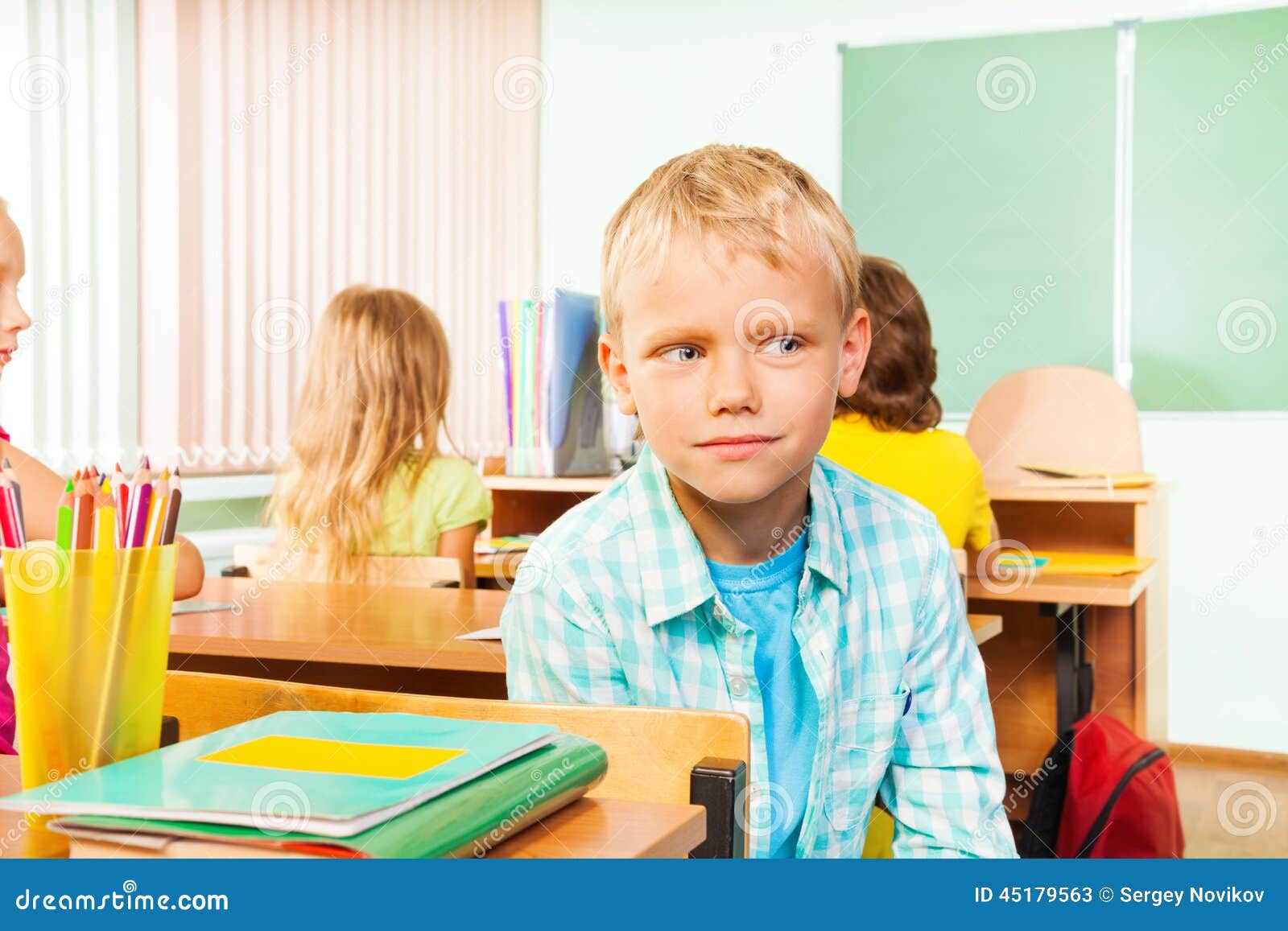 Boy Sitting in School Class and Looking Right Stock Image - Image of ...