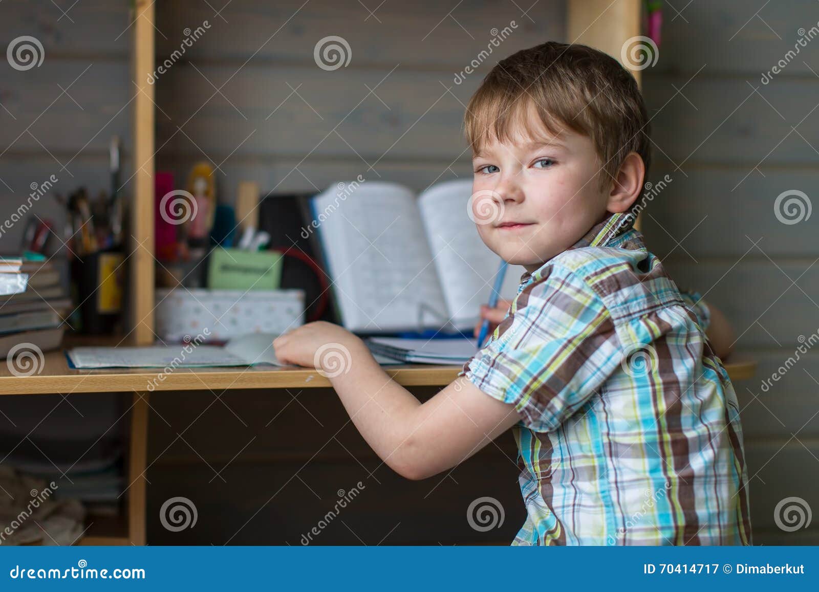 Boy Sitting at Table Doing Homework. Stock Image - Image of caucasian ...