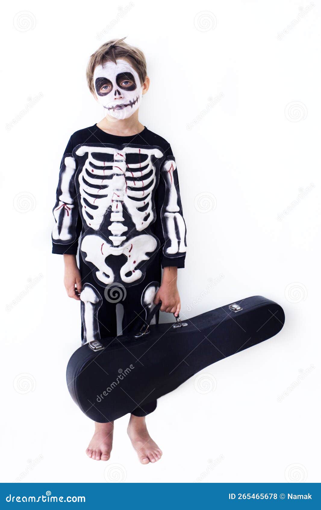 Boy in a skeleton costume stock photo. Image of aquagrim - 265465678