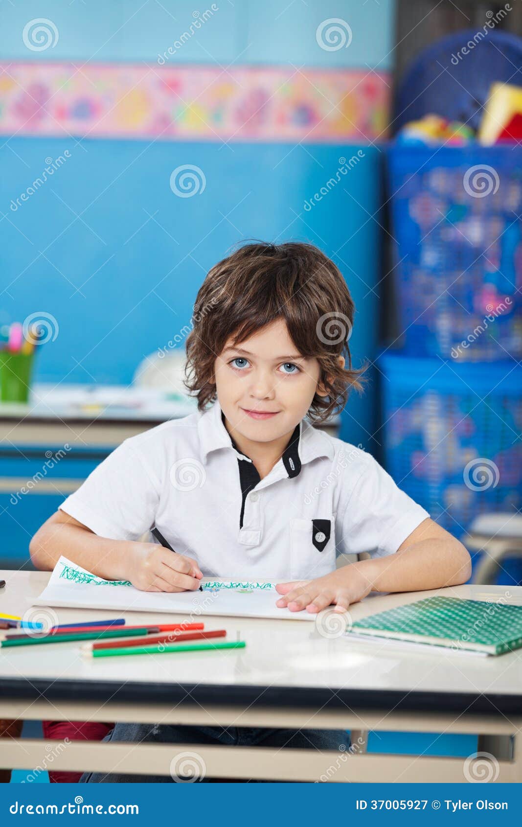 Boy with Sketch Pen Drawing in Classroom Stock Image - Image of casual ...