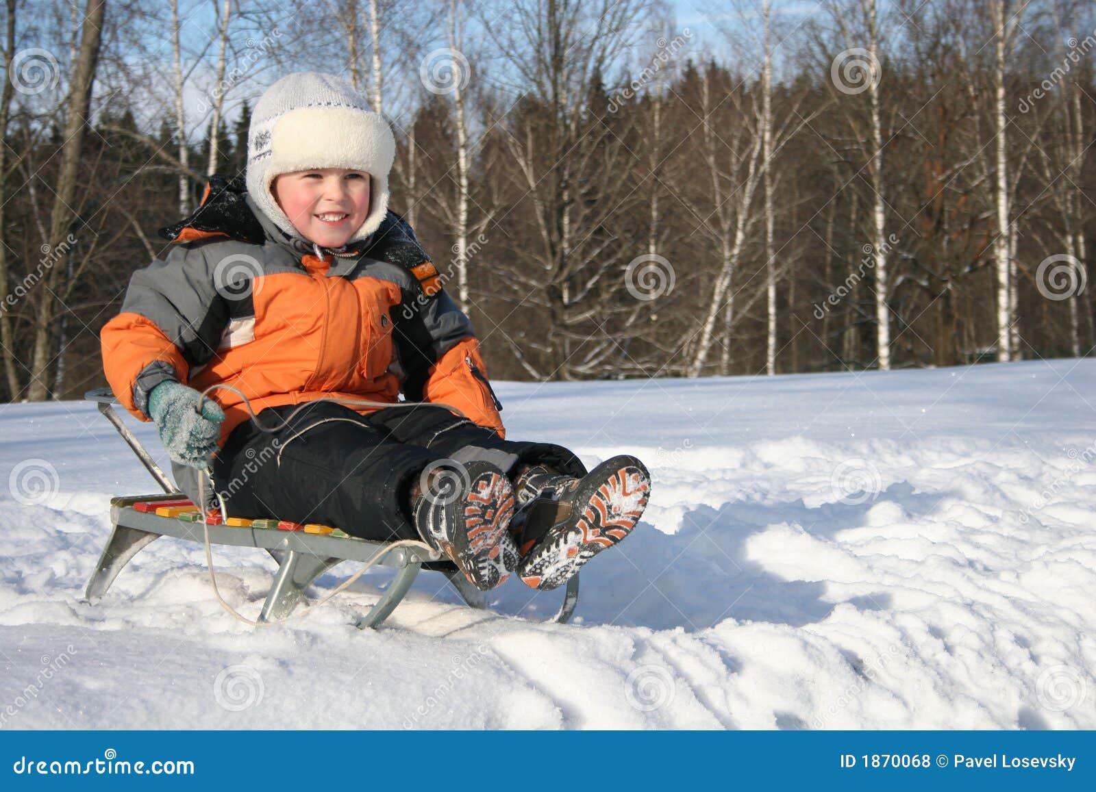Boy on sled stock photo. Image of cheerful, cute, nature - 1870068