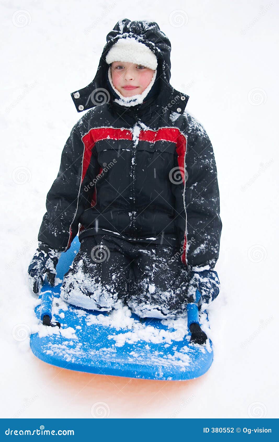 A boy on a sled stock photo. Image of fall, season, falling - 380552