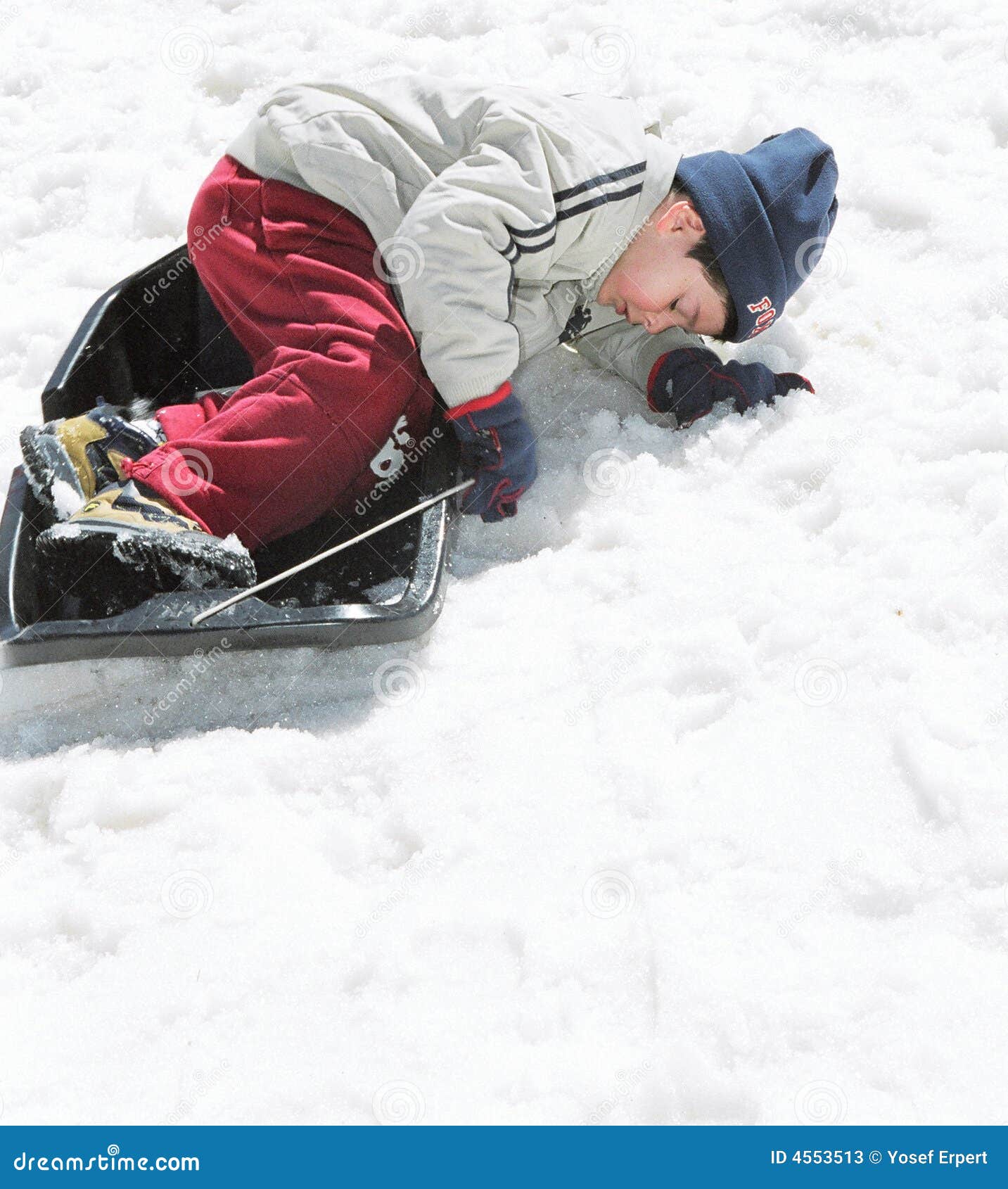 Boy on sled stock image. Image of motion, landscape, blue - 4553513