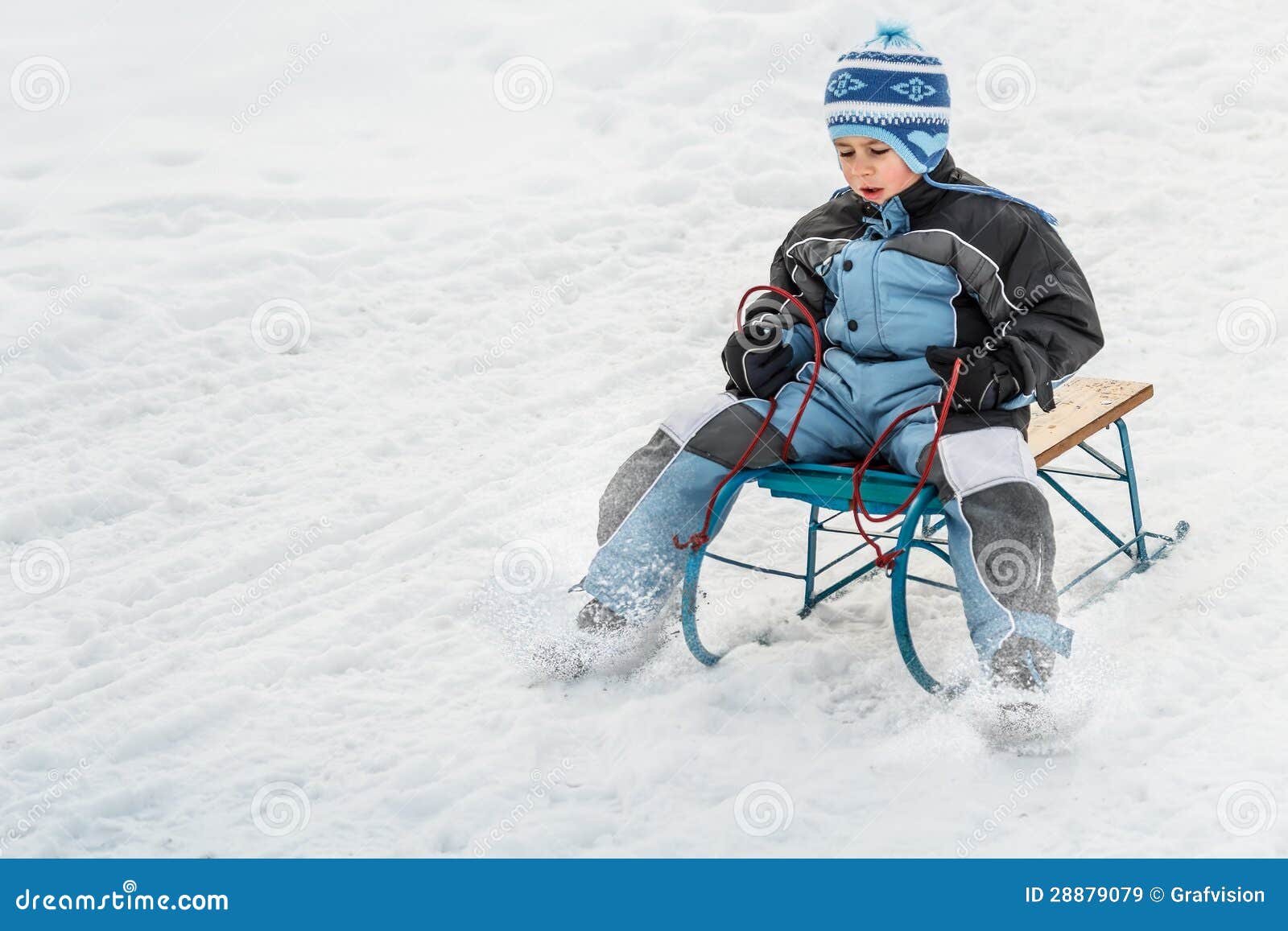 Boy sledding stock image. Image of happiness, hill, snow - 28879079